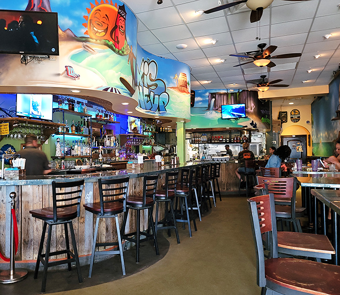 Vibrant murals and colorful walls create an atmosphere that's part beach shack, part art gallery, all delicious.