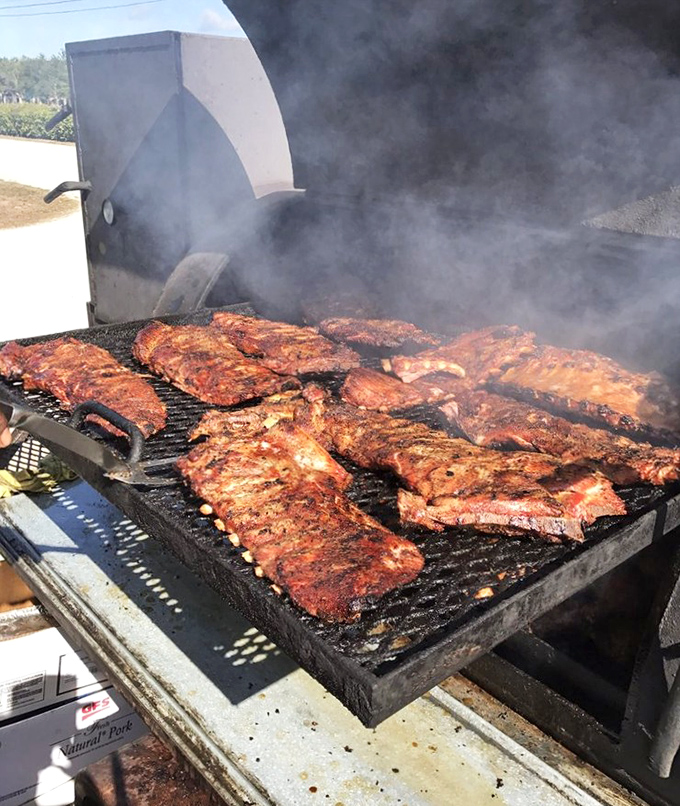 Where the magic happens &ndash; racks of ribs transforming from mere meat to transcendent barbecue in clouds of fragrant smoke.