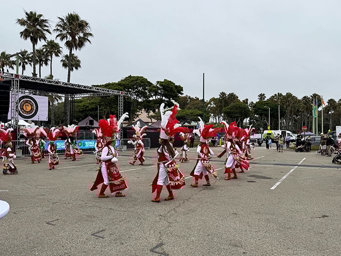 Beach festival dancers bring color and movement to a town that celebrates without corporate sponsorship taking over.