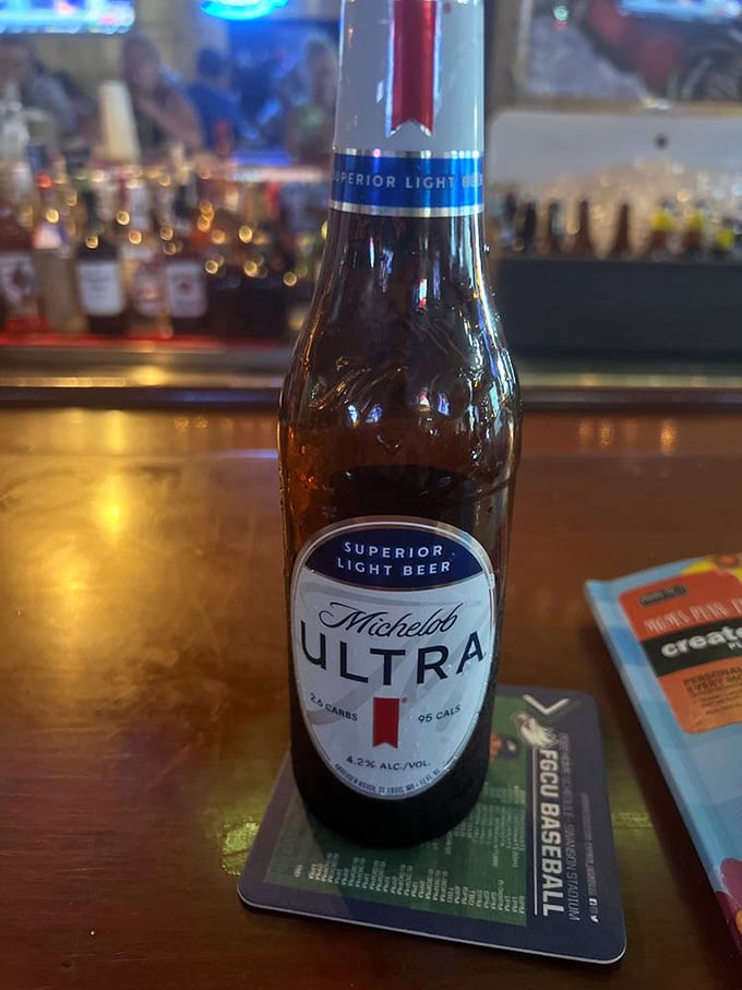 A cold Michelob Ultra waiting patiently on the bar&mdash;because sometimes you need something light to balance out those heavy BBQ decisions.