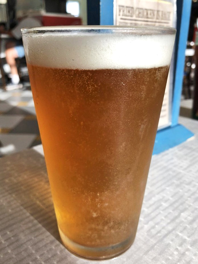 A perfectly poured draft beer with just the right amount of foam&mdash;because sometimes breakfast calls for something stronger than coffee.