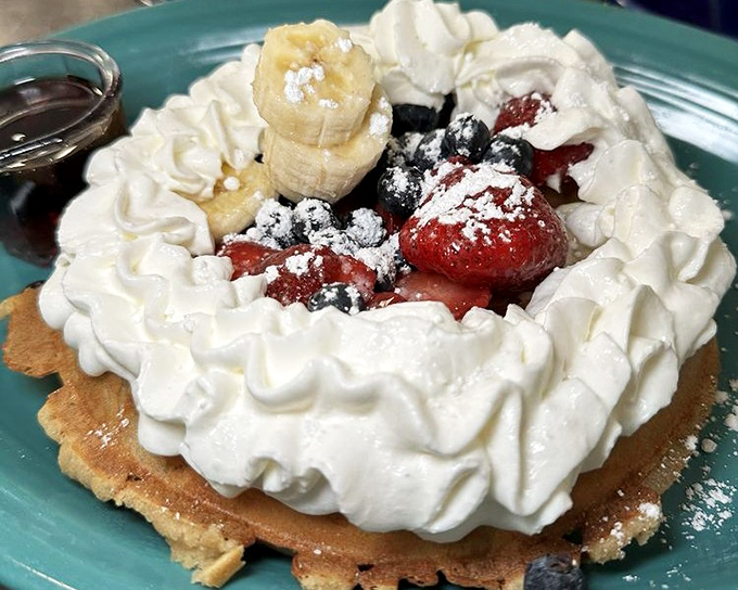 This isn't just a waffle&mdash;it's a platform for berry brilliance and whipped cream architecture that would make Frank Lloyd Wright jealous.
