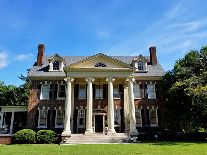 This grand colonial revival mansion looks like it should be on a historic home tour &ndash; and it is! Bed and breakfast elegance with columns to spare.
