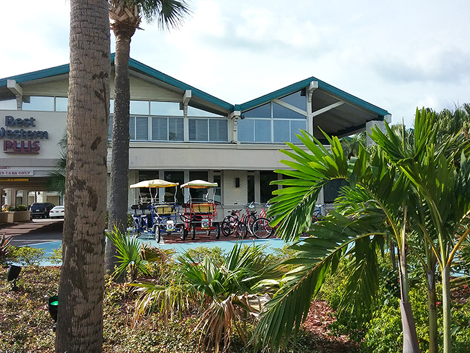 The Best Western Plus Yacht Harbor Inn offers those essential Florida vacation elements: palm trees, sunshine, and colorful rental bikes waiting for adventure.