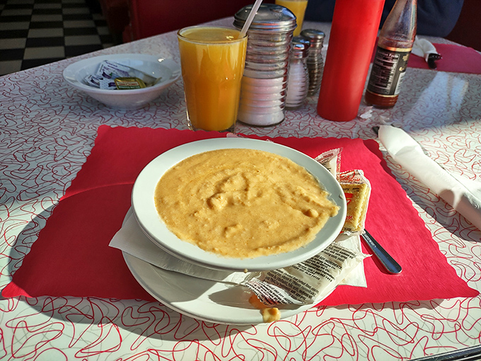 Grits that would make a Southerner nod in approval. Paired with orange juice so bright it could substitute for your morning coffee.