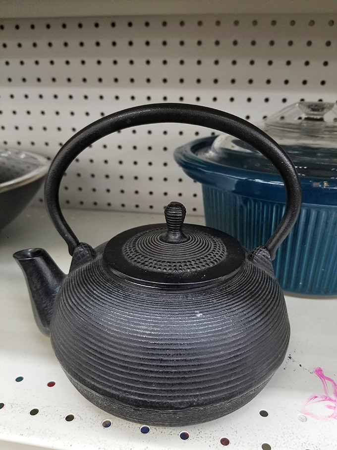 This cast iron teapot has survived decades of kitchen duty and still looks ready to serve. Quality craftsmanship never goes out of style.