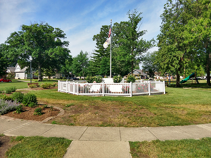 Bliss Park's white-picket gazebo and flag create that Norman Rockwell scene you didn't realize still existed outside of Hallmark movies and childhood memories.