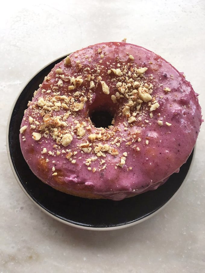 This purple-hued blueberry almond masterpiece isn't just a donut&mdash;it's edible art that happens to taste even better than it looks.
