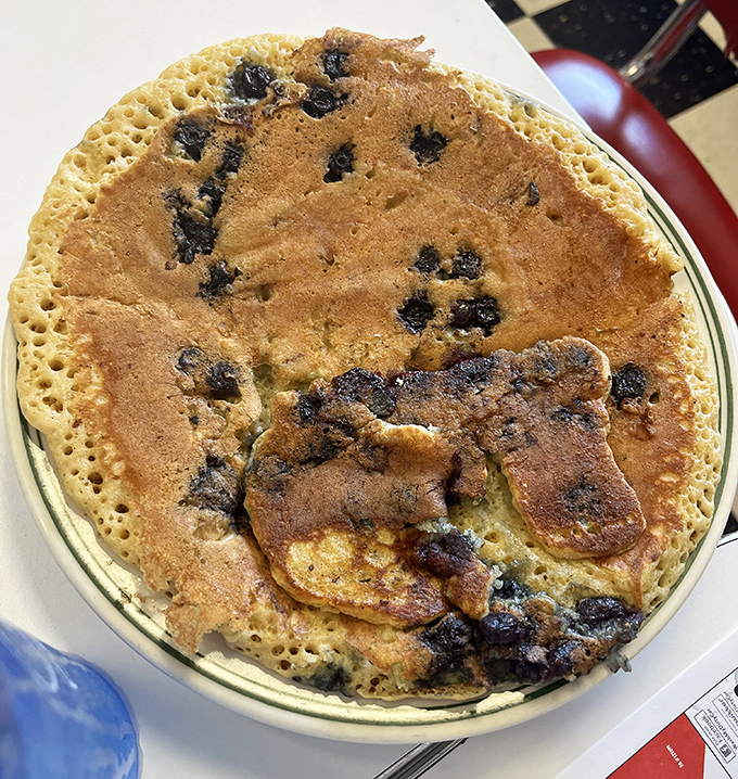 This blueberry pancake isn't just big&mdash;it's the size of a frisbee with enough berries to qualify as a fruit serving. Almost.