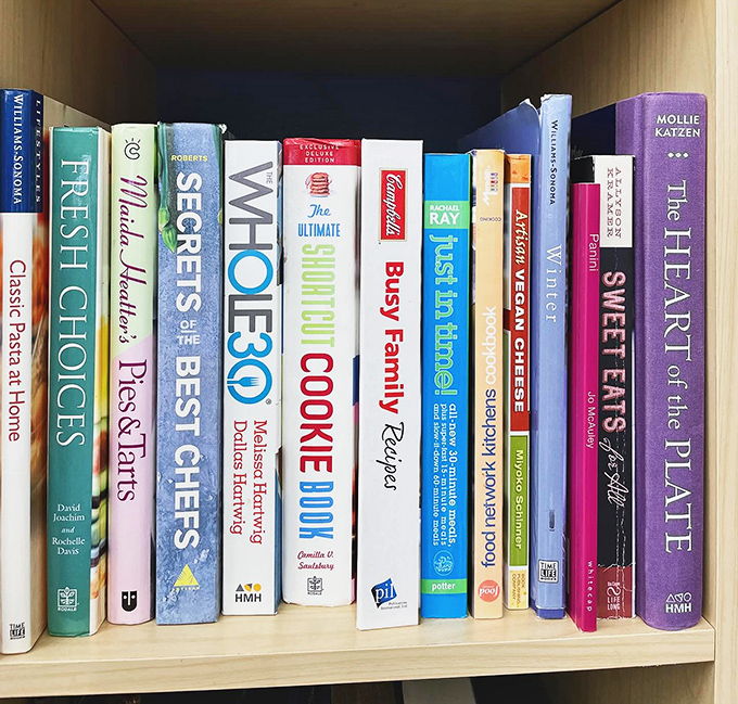 Cookbooks that have survived kitchen battles stand ready for new culinary adventures. From Campbell's classics to gourmet challenges, inspiration awaits.