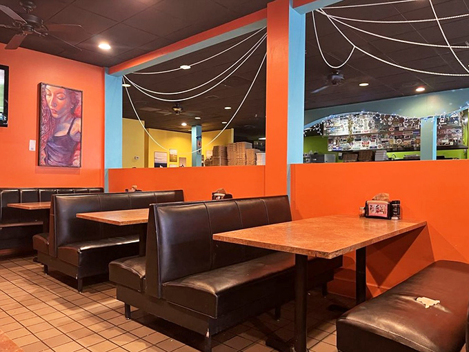 Orange walls adorned with local artwork make these booths feel like dining in a gallery. Art and pizza—Jacksonville's perfect pairing.