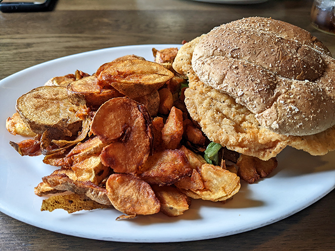 Homemade chips surround a sandwich that's built like a fortress of flavor. No wimpy lunch here&mdash;this is serious business.