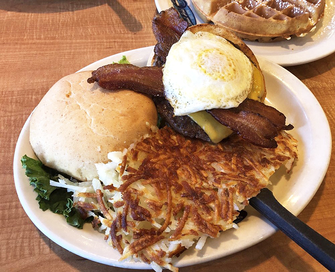 Breakfast burger with a sunny-side-up egg and crispy hash browns. When breakfast and lunch collaborate, everybody wins&mdash;especially your taste buds.