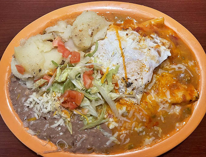 Breakfast enchiladas that blur the line between morning and afternoon meals. The perfect remedy for "I can't decide what I want" syndrome.