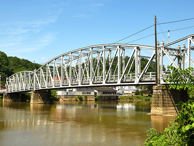 This historic bridge spans the Muskingum River like a steel sentinel, connecting communities while offering postcard-worthy views of the water below.
