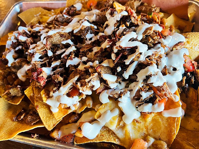 Nachos that have achieved their highest purpose in life. When chips meet brisket, it's not a snack&mdash;it's a religious experience.
