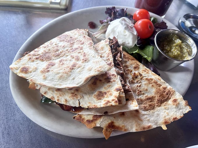 This quesadilla doesn't just satisfy hunger &ndash; it creates memories with each bite of its crispy exterior and melty interior.