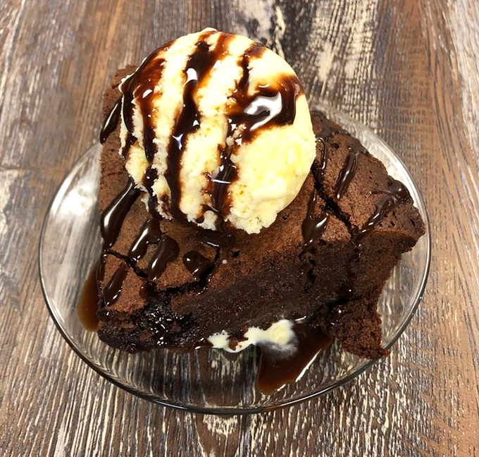 Brownie &agrave; la mode &ndash; where warm chocolate decadence meets cold vanilla in a temperature contrast that somehow feels like coming home.