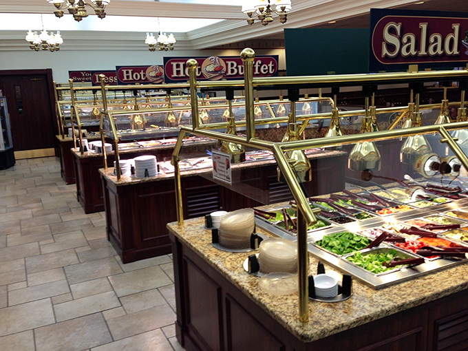The buffet station gleams with promise &ndash; a temple of abundance where difficult decisions must be made about plate real estate.
