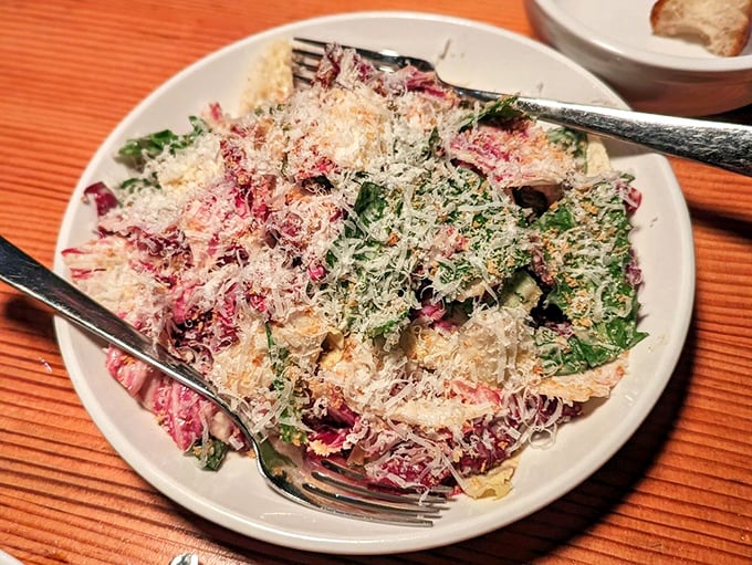 This Caesar salad isn't just a supporting player&mdash;it's a star in its own right, with shavings of cheese like confetti at a flavor parade.