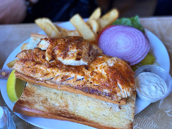 The Cajun fish sandwich: where perfectly grilled fish meets spicy seasoning in a handheld masterpiece of flavor.