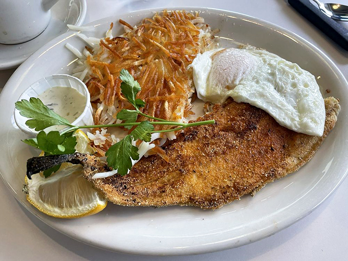 The Cajun trout with crispy hash browns proves that fish for breakfast isn't just acceptable&mdash;it's downright revolutionary.