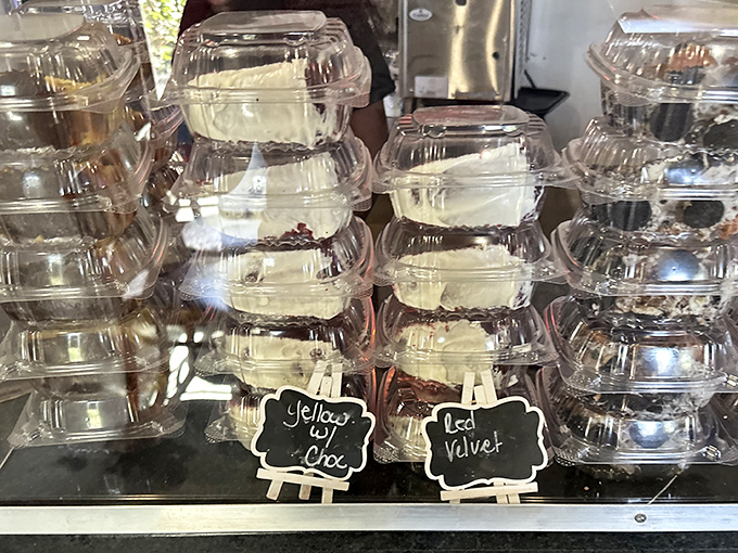 Desserts lined up like sweet little soldiers, ready to march straight to your happy place. Yellow cake and red velvet standing by for duty.