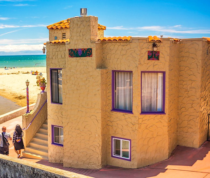 The Venetian-inspired architecture brings Mediterranean flair to California shores, with purple window frames that say, "Yes, we're confident in our color choices."