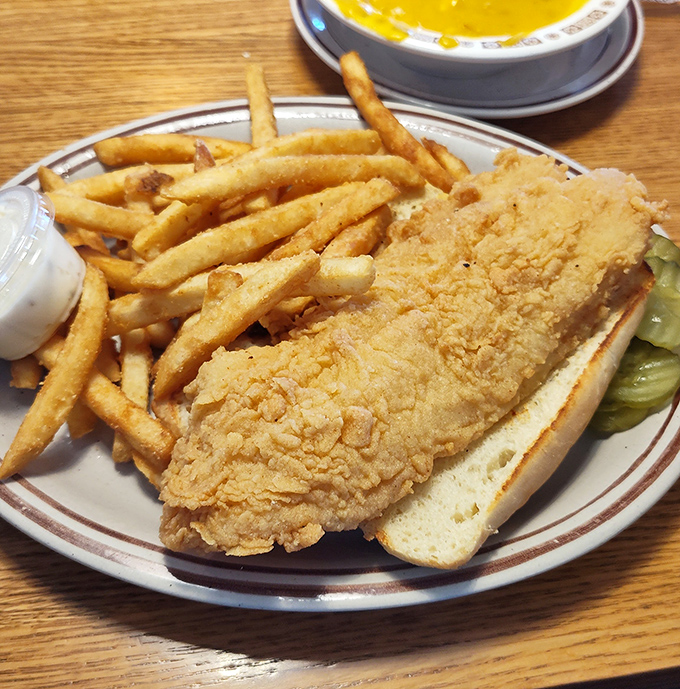 The catfish sandwich that launched a thousand road trips. Crispy, flaky, and substantial enough to fuel your afternoon adventures through Missouri.