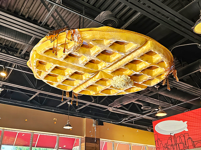That giant waffle ceiling fixture isn't subtle, but neither is your hunger when you walk through these doors.
