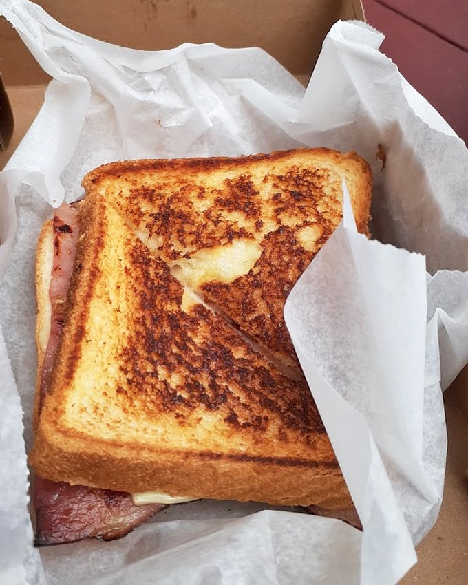 The sandwich that launched a thousand naps. Gilley's grilled ham and cheese achieves that perfect golden exterior while maintaining gooey interior bliss.