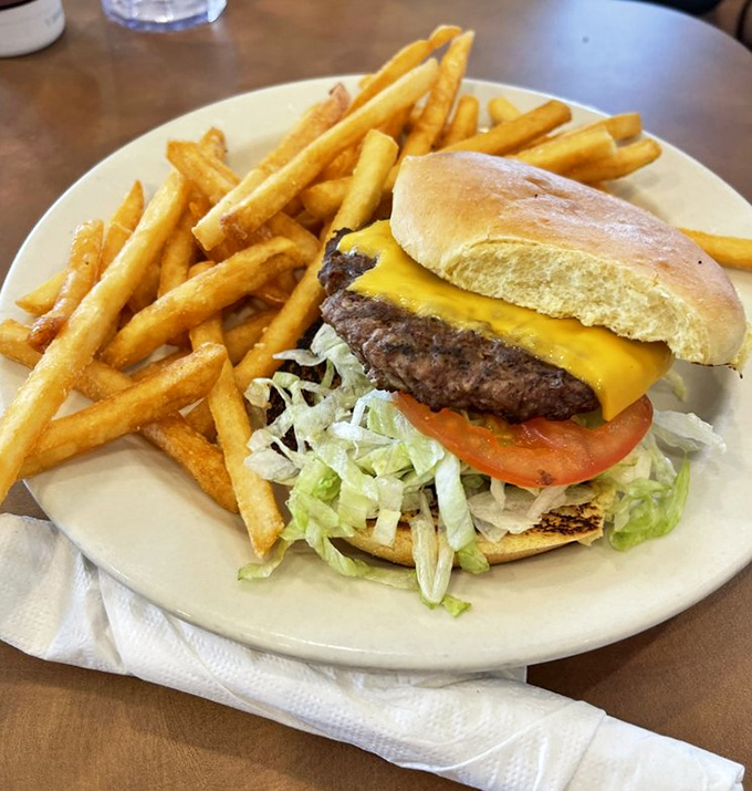 A classic American cheeseburger that doesn't need fancy aioli or artisanal buns to win your heart&mdash;just honest ingredients stacked with precision.