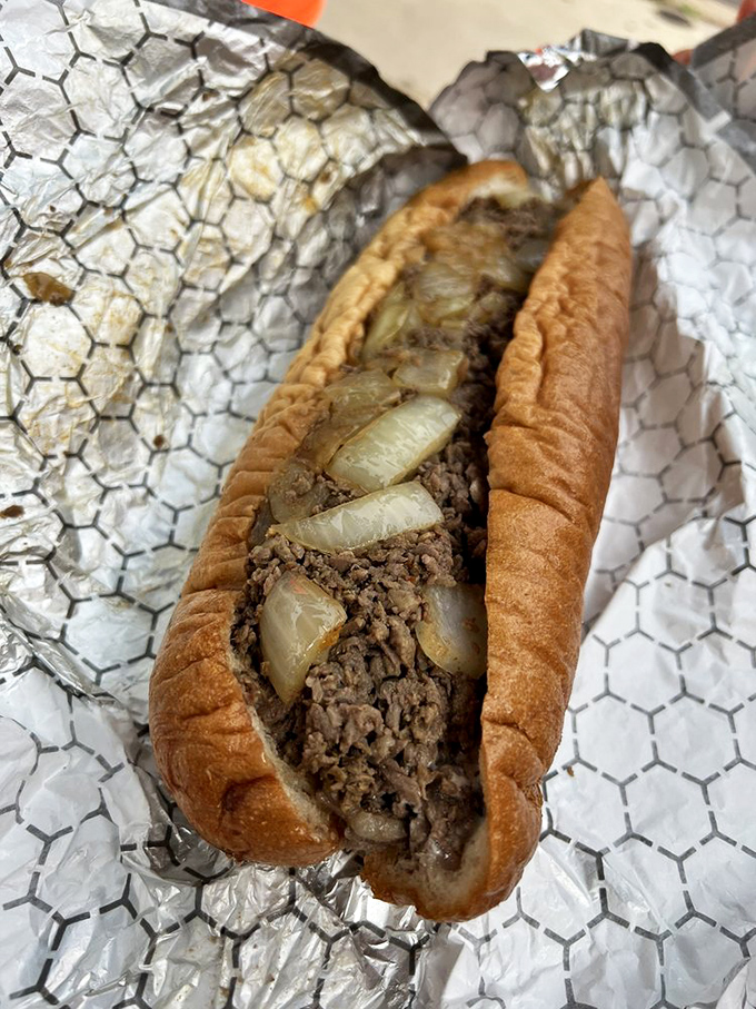 Sharp provolone adds sophisticated tang to this cheesesteak. It's like the sandwich went to finishing school but still knows how to party.