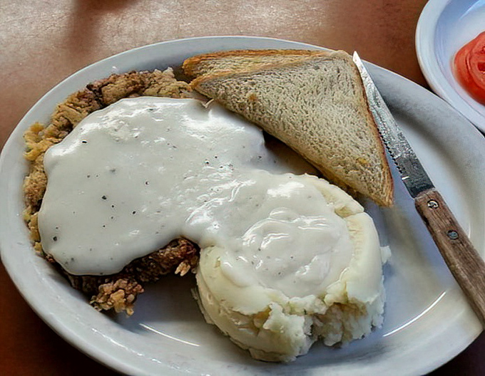 Chicken fried steak with gravy isn't just a meal &ndash; it's a cultural institution, a testament to the beautiful marriage of crispy coating and tender meat.