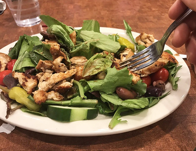 A chicken salad that proves healthy eating doesn't mean punishment &ndash; fresh greens and perfectly seasoned chicken playing nicely together.