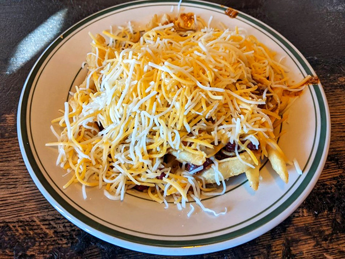 Chili cheese fries that blur the line between fork food and finger food. The cheese pull alone deserves its own Instagram account.
