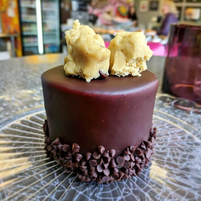 This chocolate masterpiece topped with cookie dough chunks isn't just dessert—it's what would happen if joy took physical form.