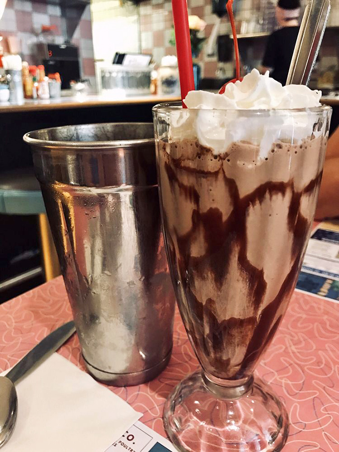 Chocolate shake perfection&mdash;the kind that makes you wonder why you ever order anything else. Extra points for the metal mixing cup on the side.