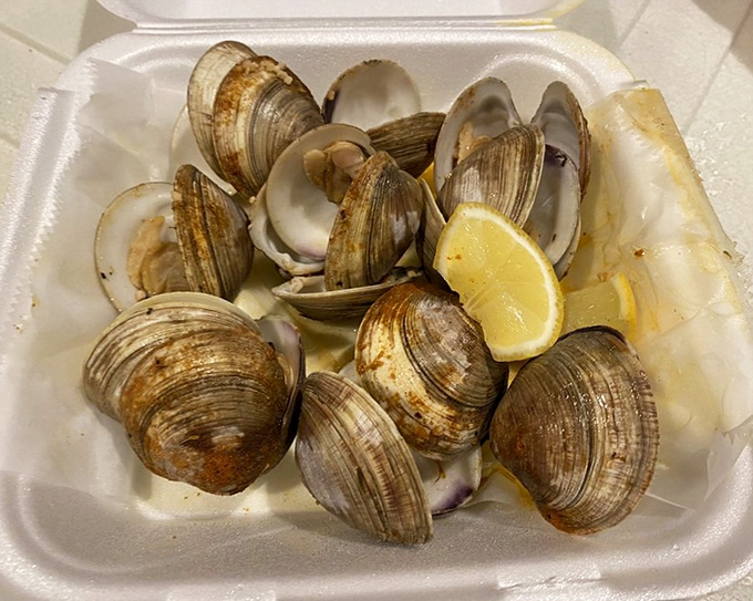 These steamed clams have that "just-plucked-from-the-sea" quality that makes seafood lovers weak in the knees. Simple perfection with a squeeze of lemon.