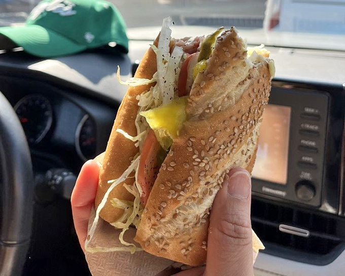 The sandwich that launched a thousand return visits. Those layers are more meticulously constructed than most people's retirement plans.