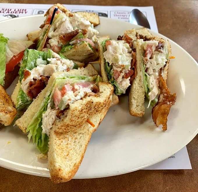 The club sandwich &ndash; a three-story monument to lunch perfection that requires both hands and possibly a strategy meeting before eating.