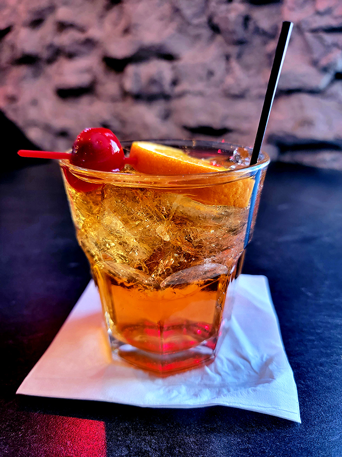An Old Fashioned with proper garnishes&mdash;because in Wisconsin, cocktail cherries and orange slices count as essential food groups.