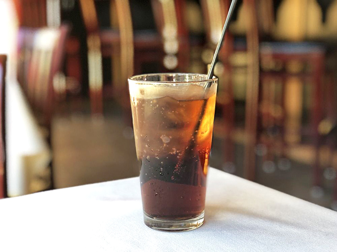 Even the soda looks sophisticated here &ndash; dark, effervescent, and served in a proper glass with a straw that means business.