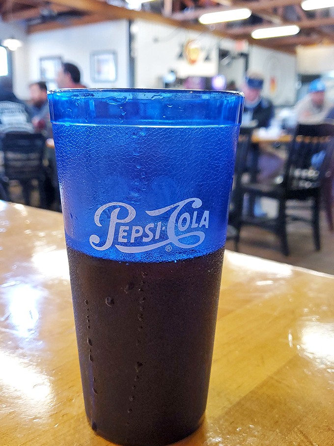 The two-tone Pepsi glass&mdash;a nostalgic vessel for sweet tea or soda that completes the authentic Southern dining experience.