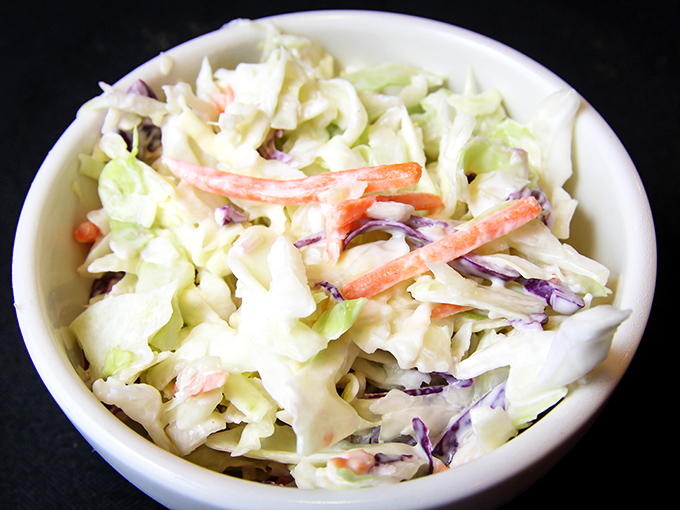Even the coleslaw gets special treatment here &ndash; fresh, crisp, and not drowning in dressing. The perfect cool counterpoint to those hearty sandwiches. 