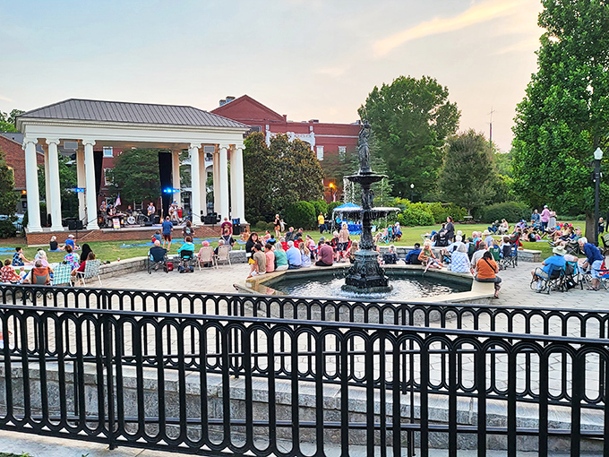 Summer concerts by the fountain where locals gather with lawn chairs and picnic baskets&mdash;Norman Rockwell would need more canvas.