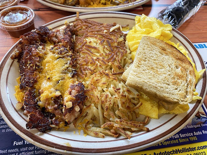 Corned beef hash with eggs and hash browns &ndash; the breakfast equivalent of a warm hug from someone who really knows how to cook.