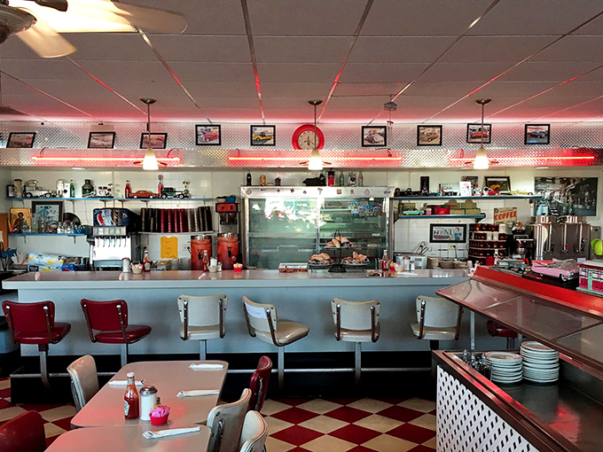 The counter seating offers front-row tickets to the culinary show, where breakfast dreams become delicious reality.