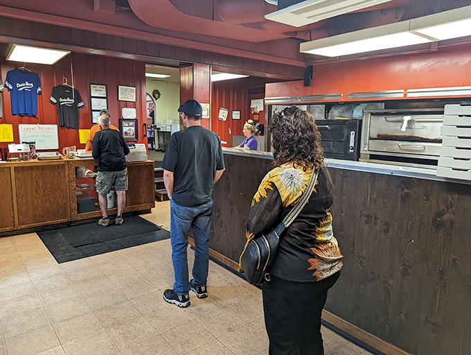 The bustling counter where pizza dreams come true &ndash; watch the magic happen right before your eyes.