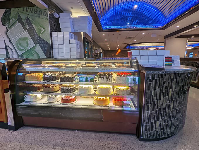 The dessert case&mdash;where willpower goes to die and "I'll just have coffee" turns into "I'll have the chocolate cake AND the cheesecake."